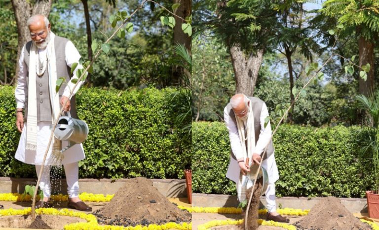 Prime Minister Narendra Modi Planting Sapling at Sabarmati Ashram